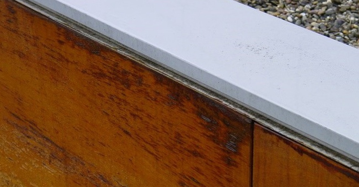 Woningborg | Gedelamineerde gevelbeplating